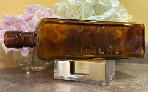POND'S BITTERS AN UNEXCELLED LAXATIVE AMBER GLASS BOTTLE | Ed The Diver