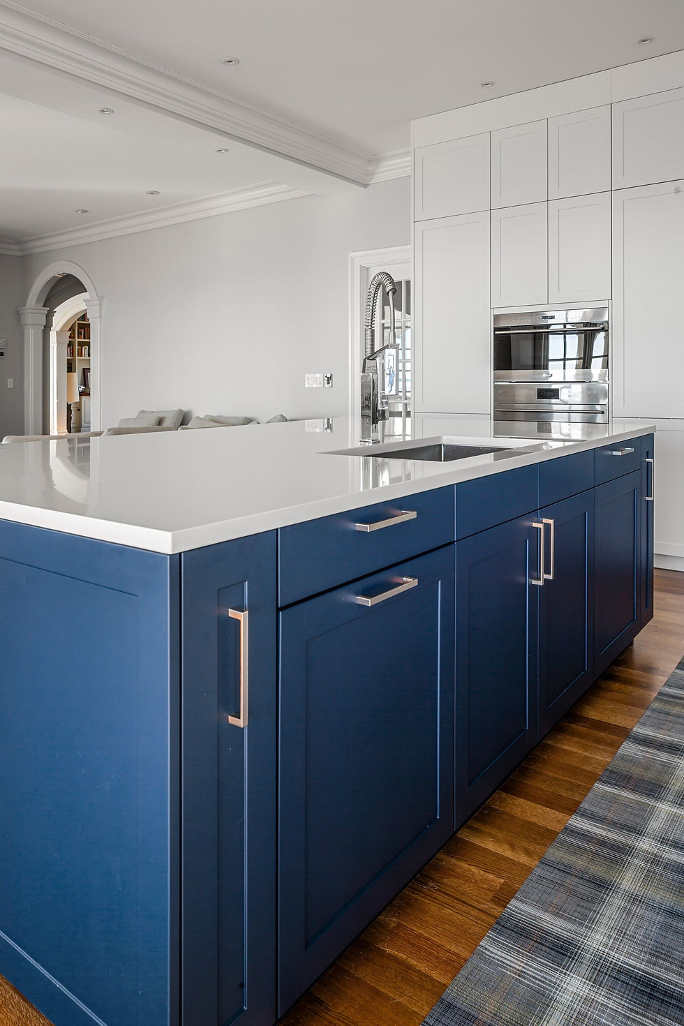 Transitional Splendor: Midnight Blue Cabinets in a Sunlit Spanish Kitchen