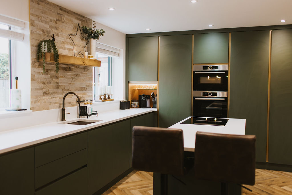 GREEN AND BRASS HANDLELESS KITCHEN