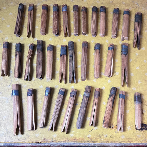 Thirty Three Antique Wood and Tin Gypsy Pegs | Briggs & Oliver