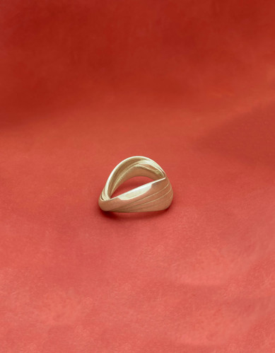 Spinning Oloid Ring | unravel