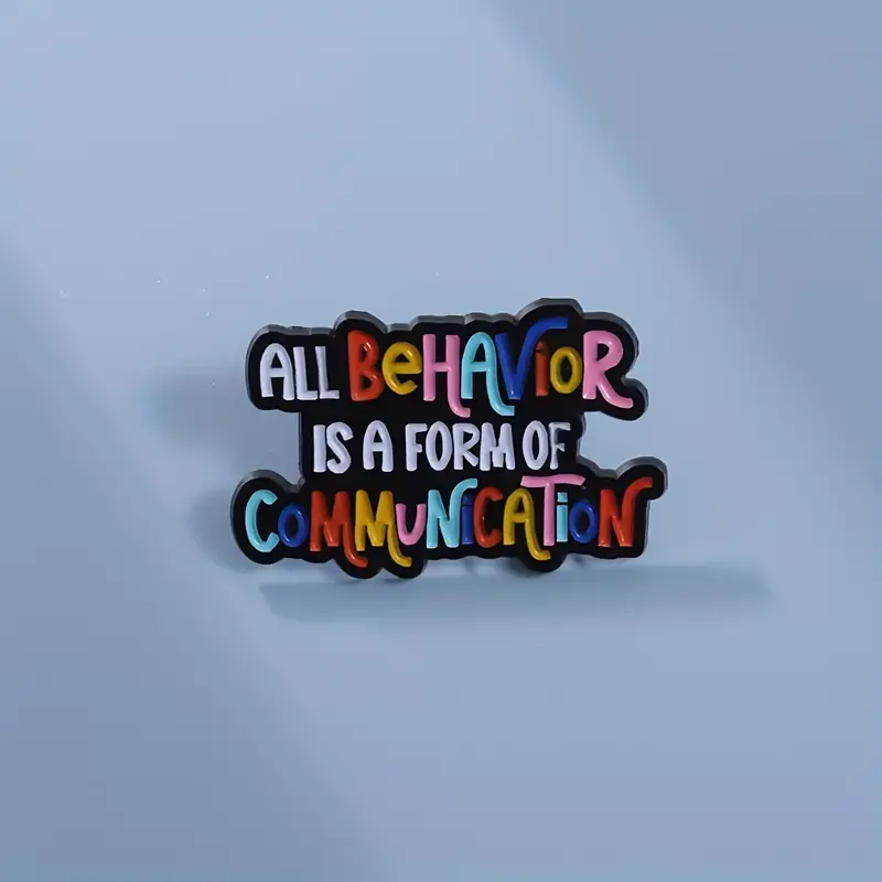All Behaviour Is A Form of Communication pin/brooch | Orange Elephants CM