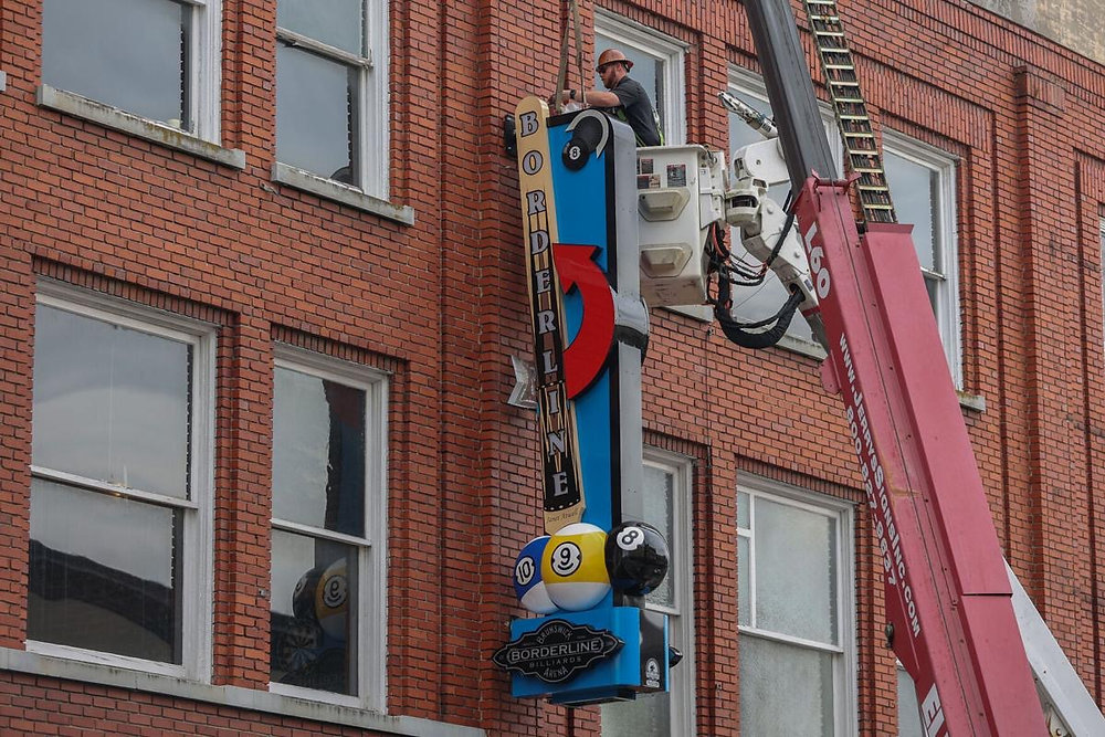 BHC: New Landmark Sign Signals Move