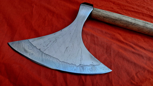 Danax with inserted damascus edge | website