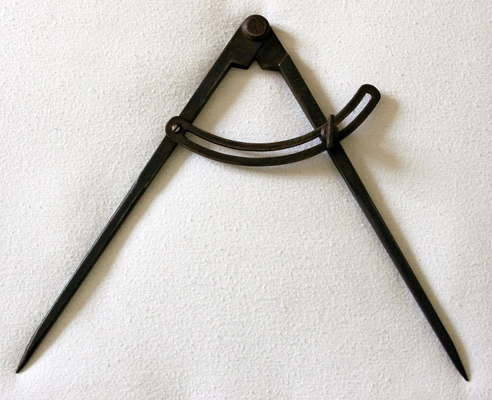 Le compas à secteur