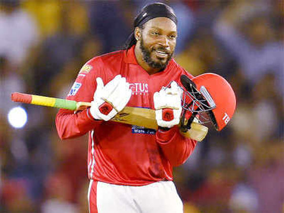 GAYLE SIGNS OFF WITH HUNDRED