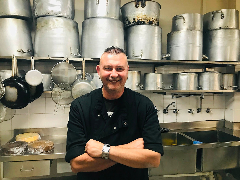 David shows leadership through his cooking