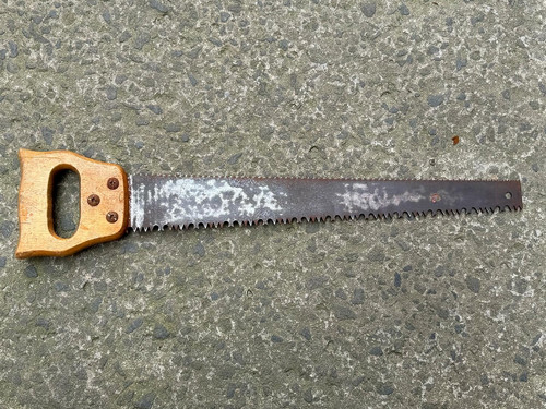 Rusty Vintage Woodworking Hand Saw with Wooden Handle | Mysite