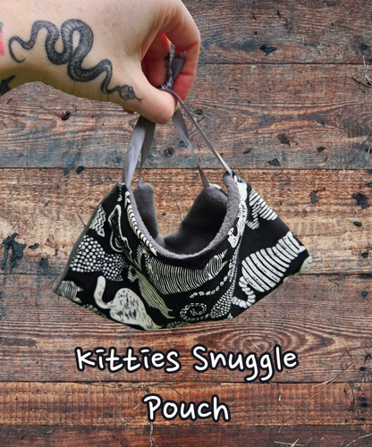 Snuggle Pouch | Unheavenly Creatures