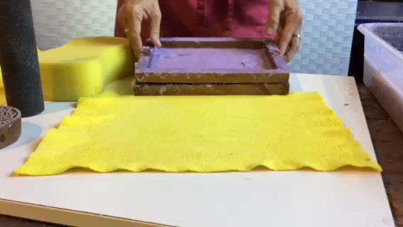 Couching that piece of paper.