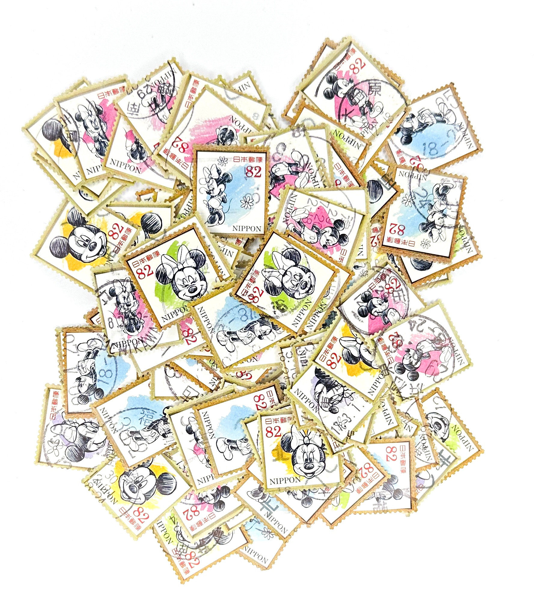 100 x francobolli giapponesi pesantemente cancellati Topolino e Minnie usati