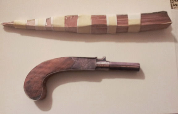 Vampire stake and pistol | murdermysterygames