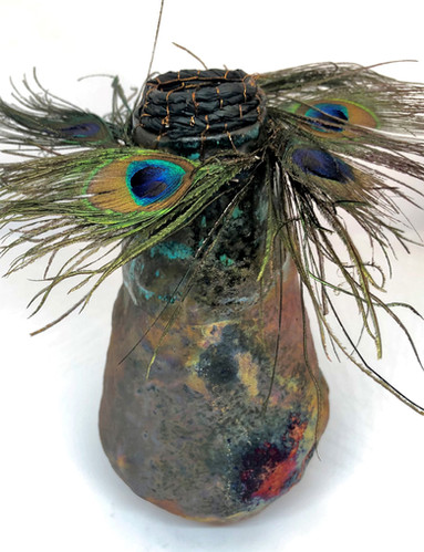 woodfired raku vessel with peacock feathers | pots & bobs