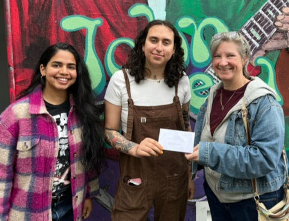 Pivot Makes a Donation to QMUNITY