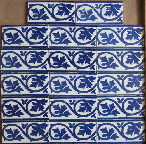 A collection of 17 foliate scroll tiles - blue and white | pugin-tiles