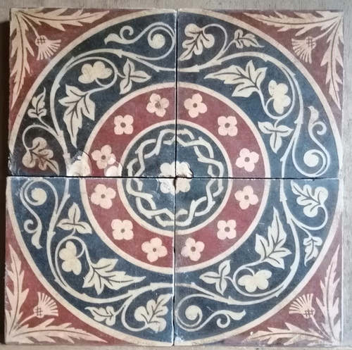 Scrolling vine roundel with thistles | pugin-tiles