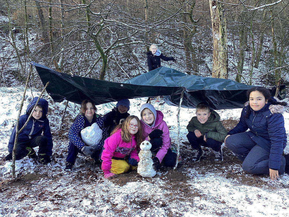 Snow-covered Forest School in year 5