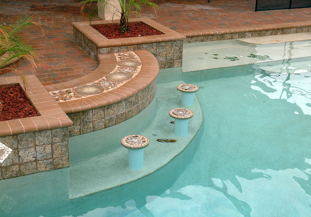 Swim up pool bar with custom tile mosaic
