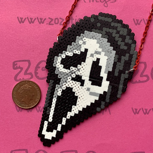 Buy our Scream 'Ghostface' Pixel Necklace brought to you by ZoZoTings.com