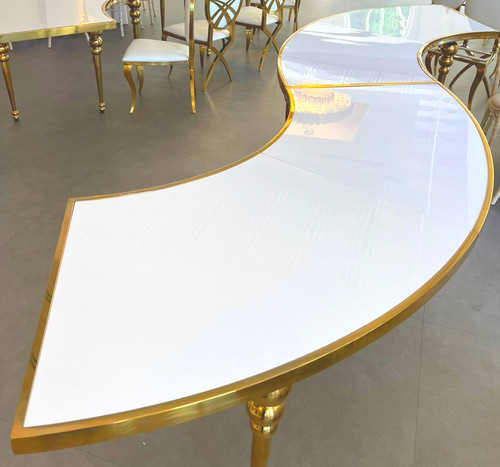Vegas gold serpentine table with white top hire | Jaydas Events