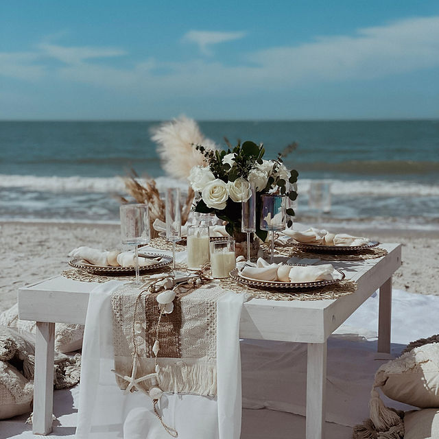 romantic beach picnic setup