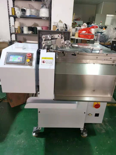 Hangtag knot tying machine | stringer-machine