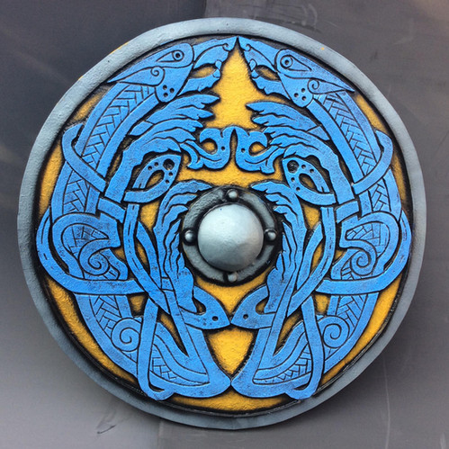 35 inch Facing Dogs Shield | website