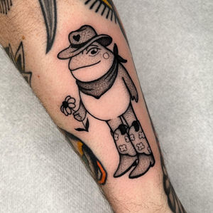 upside down frog tattoo