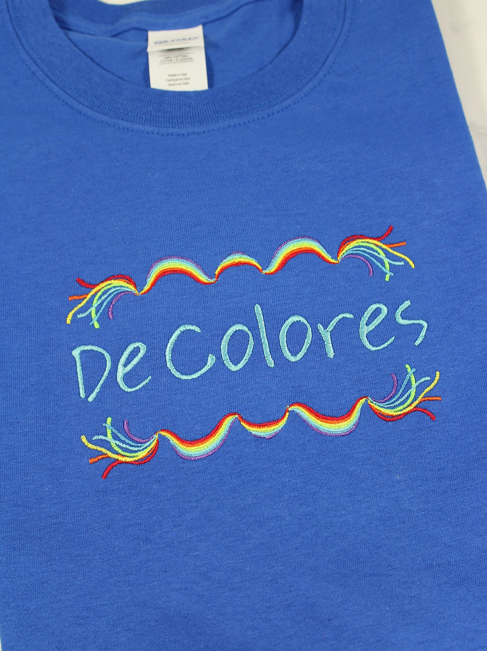 Emmaus De Colores Embroidered Rainbow Banner T-Shirt | mainelyapplique