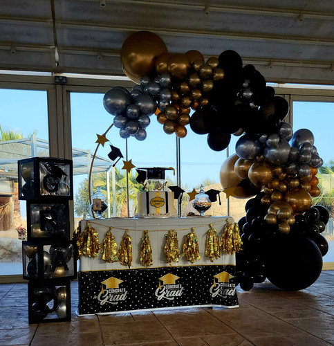 Graduation party set up. Balloon arch. Balloon arches on frame.Table de ...