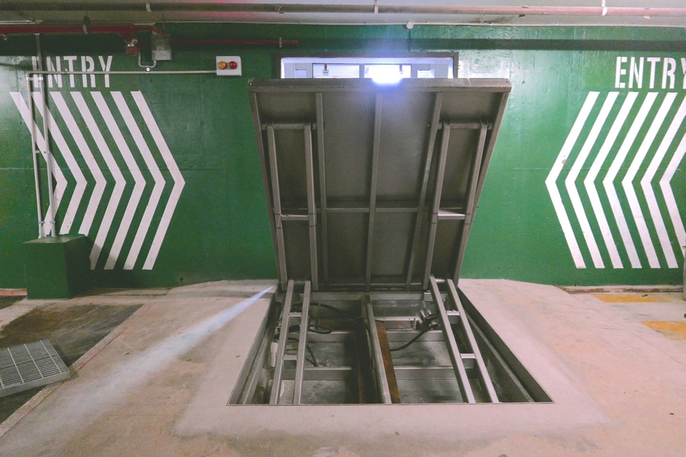 Ram Push barrier completely seals building opening between car park and ...