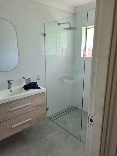 Frameless fixed panel shower screen | Sydney showers and g