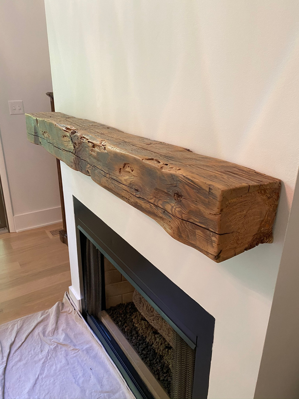 Rustic reclaimed beam floating mantel | GALLERY