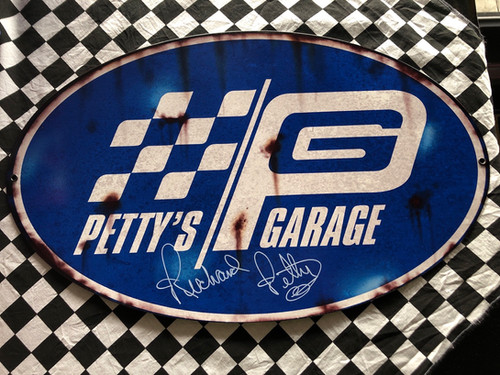 Vintage distressed Petty Garage metal sign | Pettymuseum