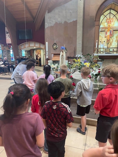 MAY CROWNING OF MARY WITH RELIGIOUS EDUCATION STUDENTShttps://static.wixstatic.com/media/ddf248 ...