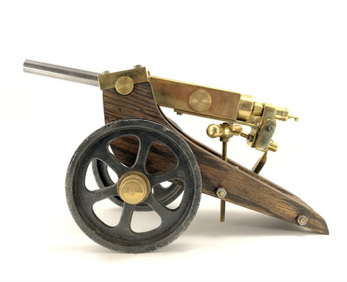 A machinist's hand-crafted cannon model, steel, brass & oak ...