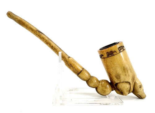 An Inuit carved bone smoking pipe in the form of a polar bear, c1900 or ...