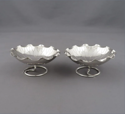 A pair of Chinese Export silver bon bon dishes by Wang Hing & Co Hong ...