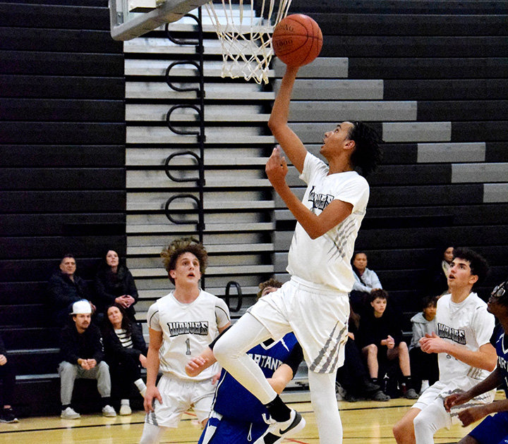 Sr. Wolves boys basketball team starts season with two losses