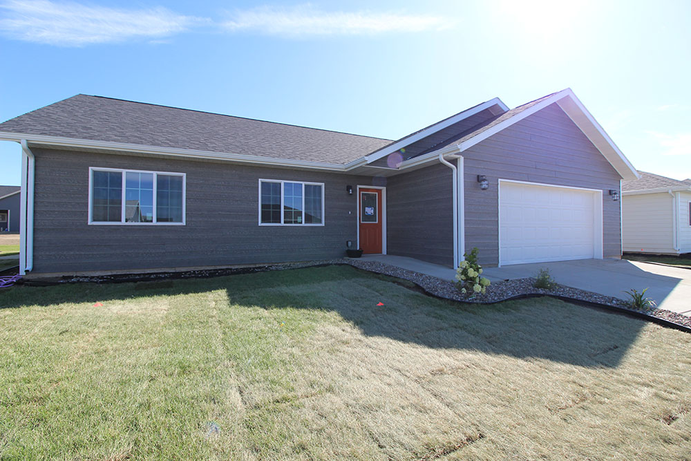 Building Homes, Building Dreams: Ten Local Families Build Their Own Homes