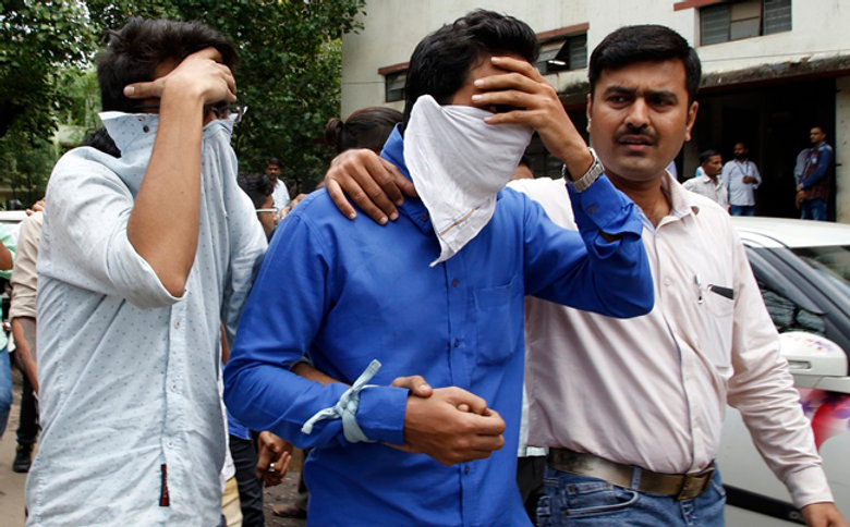 Dozens arrested at India call center linked to IRS scam calls