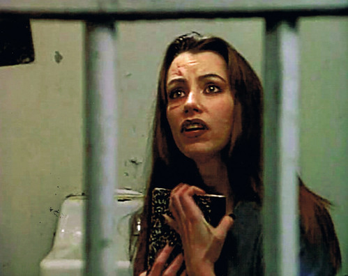 Hellblock 13 photo holding book | Debbie Rochon