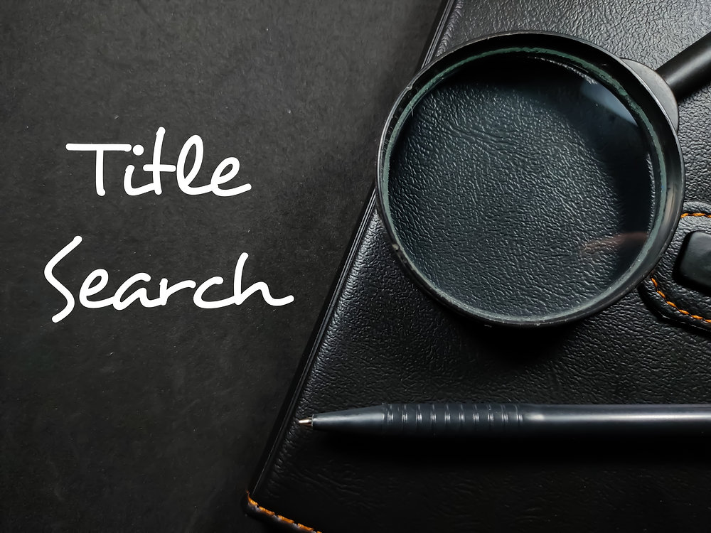 Unlocking the Past: The Importance of Title Searches in Real Estate