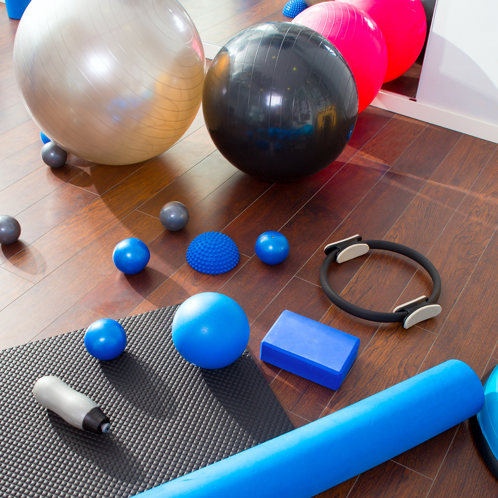 Enhancing Your Pilates Practice with Props: A Comprehensive Guide