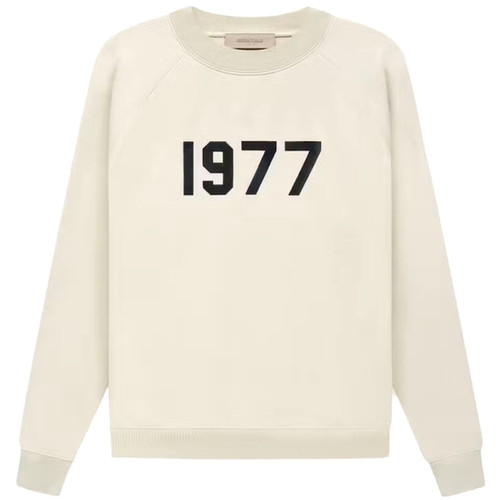 ESSENTIALS 1977 LOGO SWEATER - WHEAT | outcaststorebkk.com