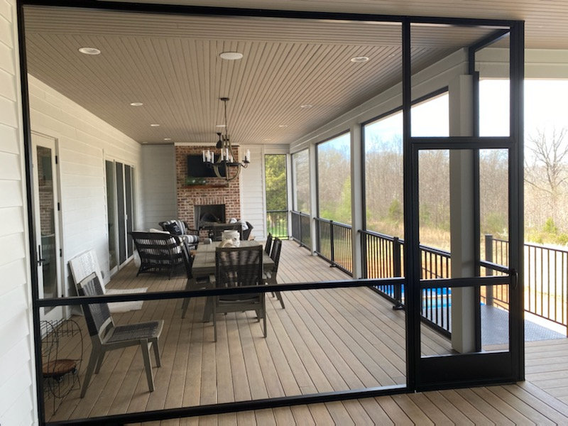 Screen Porch With A Modern and Inviting Feel