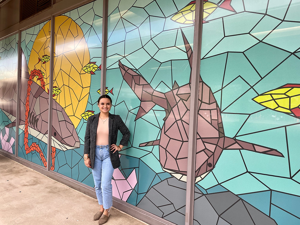 Meet Taylor Torres, the inspiring artist behind Leeward's library mural