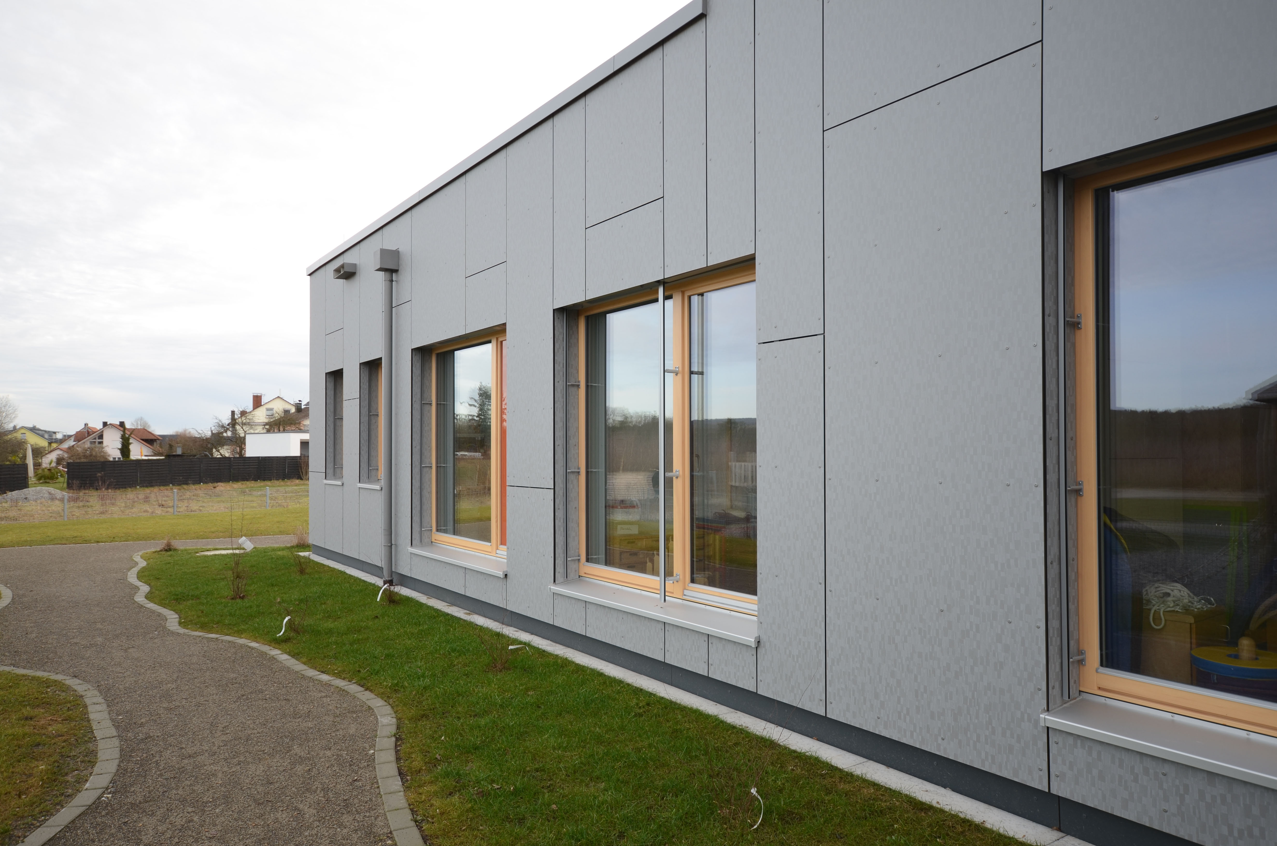 Holzbau Leopold GmbH & Co.KG | Trespa Fundermax Fassaden