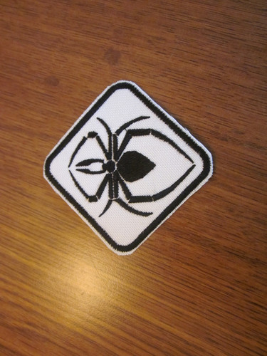 black spider on white patch 2 X 2" | lynnsembroidery