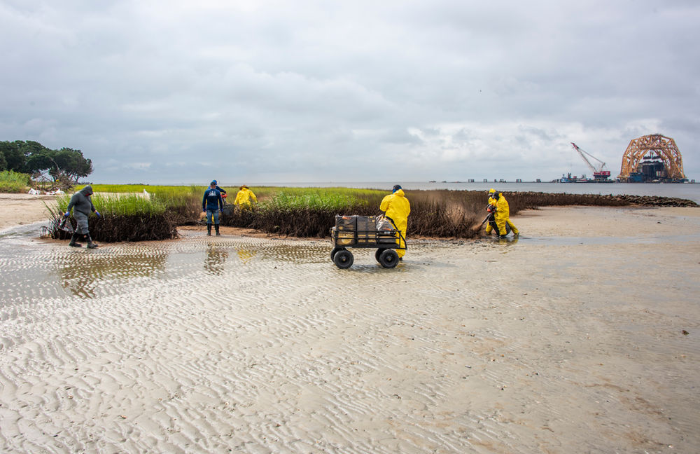 Shoreline clean-up and oil recovery continues